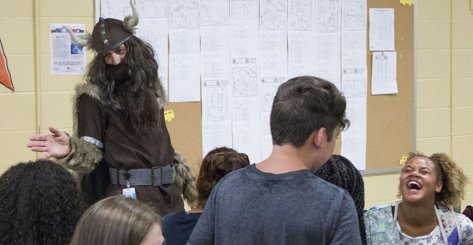 Kennesaw mayor Derek Easterling welcomes students dressed as a Viking ...