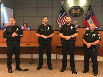 Promoted Kennesaw officers recognized by council | News | mdjonline.com