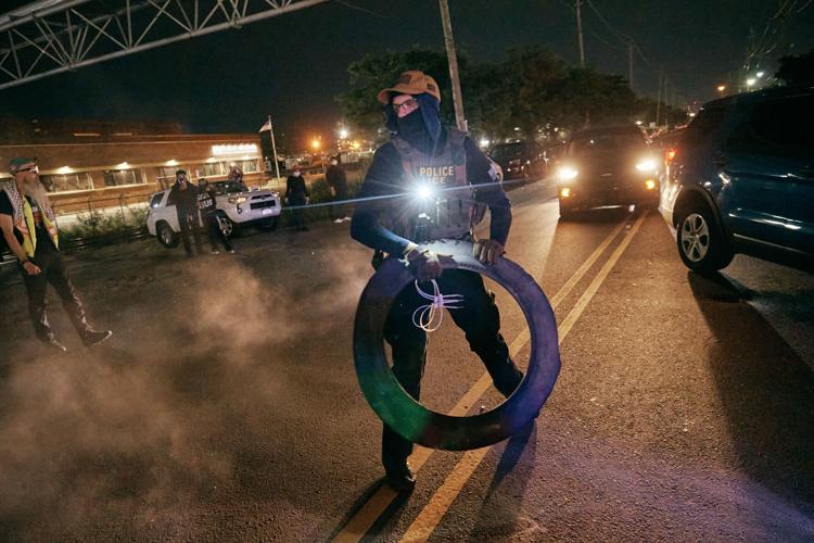 Protesters clash with law enforcement outside a New Jersey detention ...