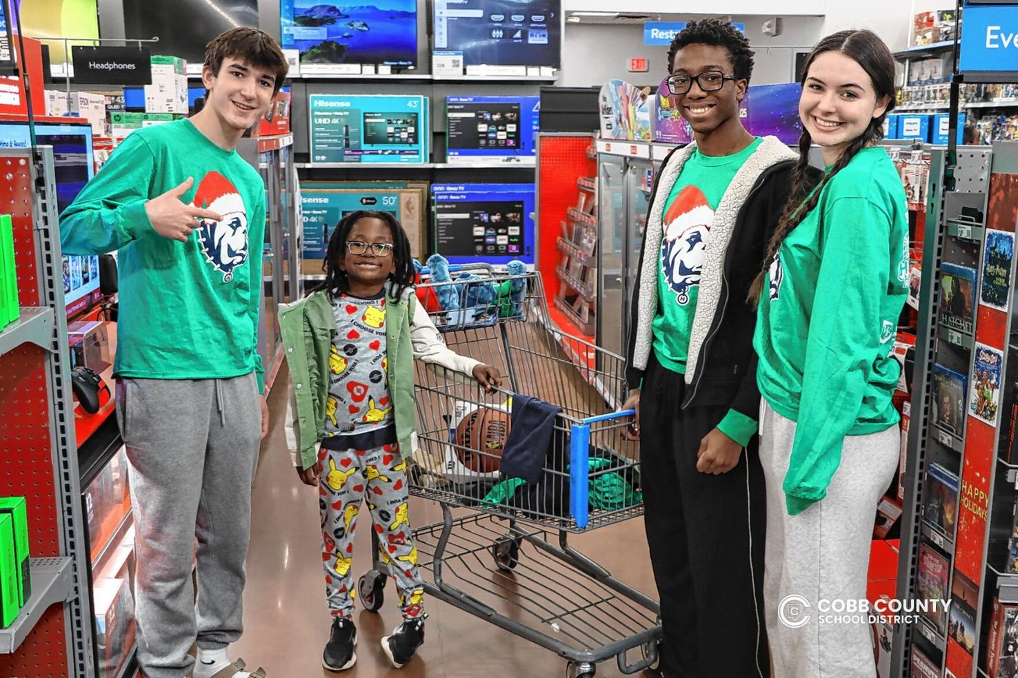 Cobb high school students spread holiday cheer through annual “Shop ...