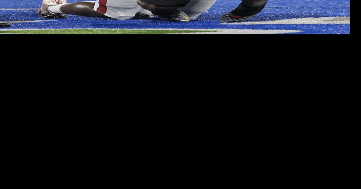 Hillgrove Hawks junior DL Nick Mathious (54) and sophmore DL Chris ...