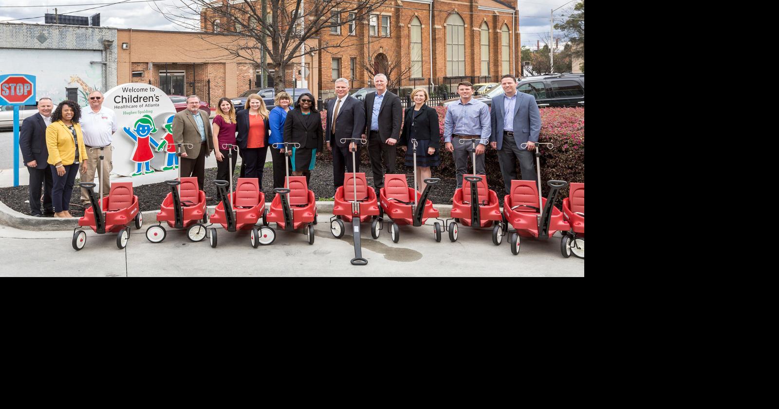 Lockheed Martin delivers red wagons to Children’s Healthcare | Cobb ...