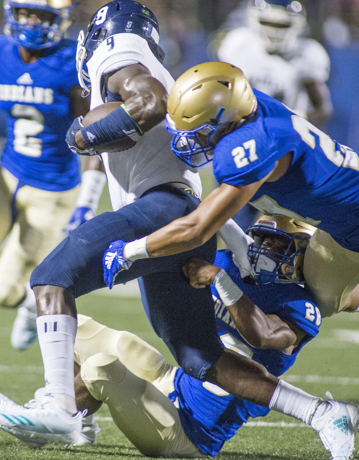 McEachern holds off Class AAA power Cedar Grove | Cobb Football Friday ...