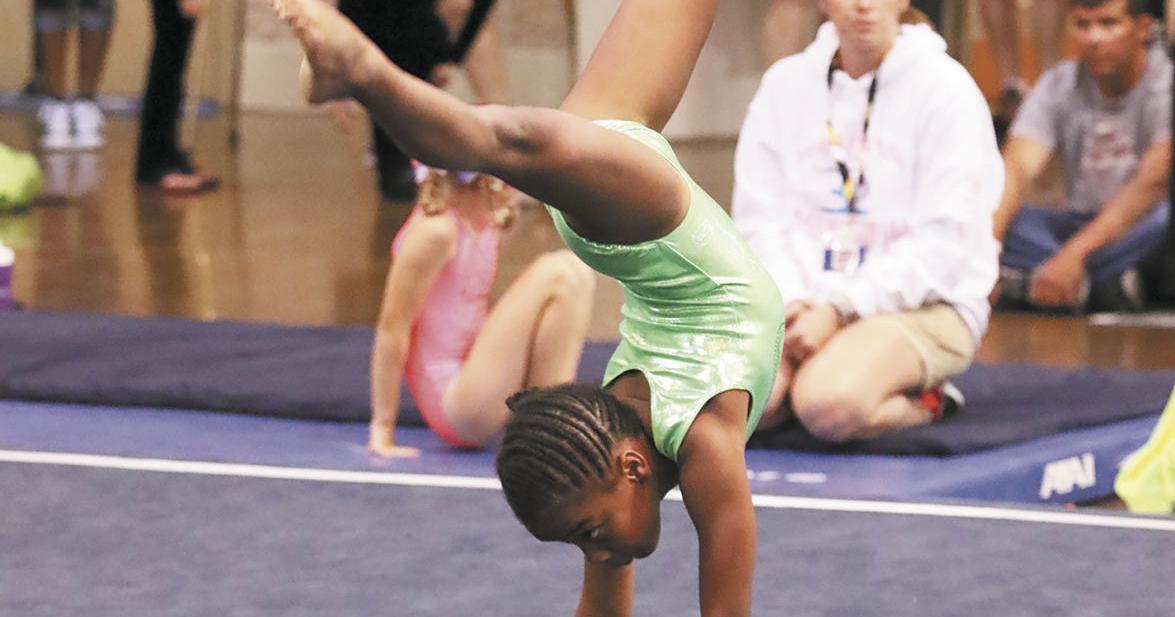 Balancing act: Miami gymnast Nya Harris-Middleton secures 4 Medals ...
