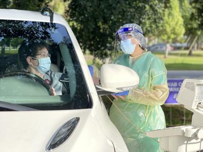 Faces behind the mask | Corona Coverage | midfloridanewspapers.com