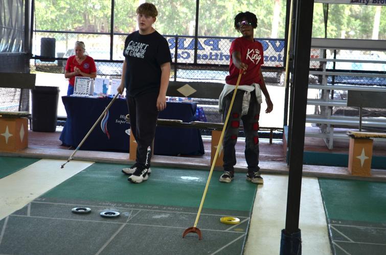 Local youth introduced to Avon Park shuffleboard to kick off summer ...