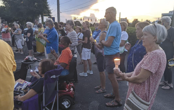 ‘Good Trouble’ candlelight vigil | Triangle News Leader ...