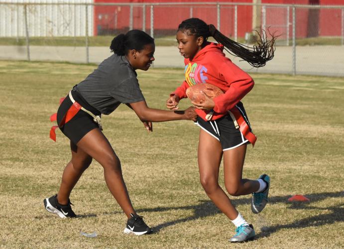 Lady Red Devils are putting in the work on the gridiron | Local ...