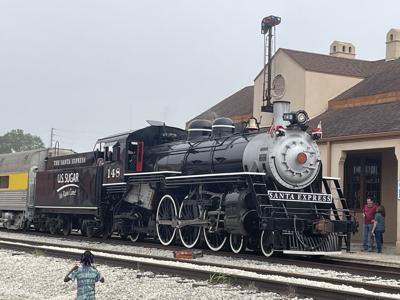 Historical Society holds charity auction for ride on Sugar Express ...
