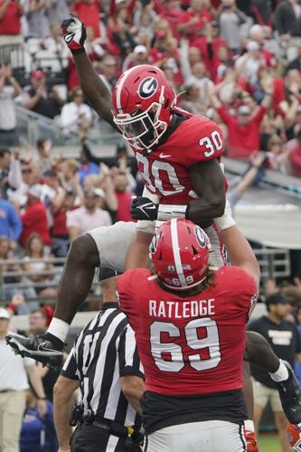 No. 1 Georgia pulls away late, wins 'Cocktail Party' 42-20 | Highlands ...