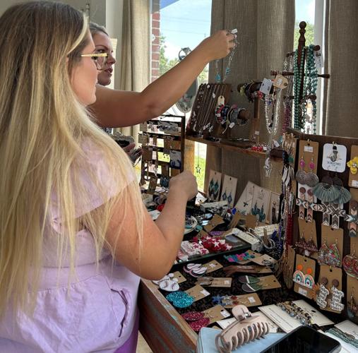 Rustic Chic Boutique features fashions, accessories ...