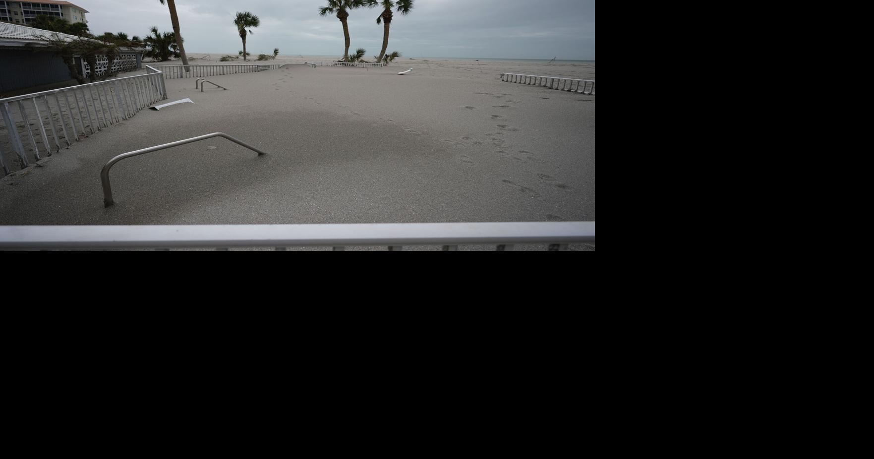 Florida digs out of mountains of sand swept in by back-to-back ...