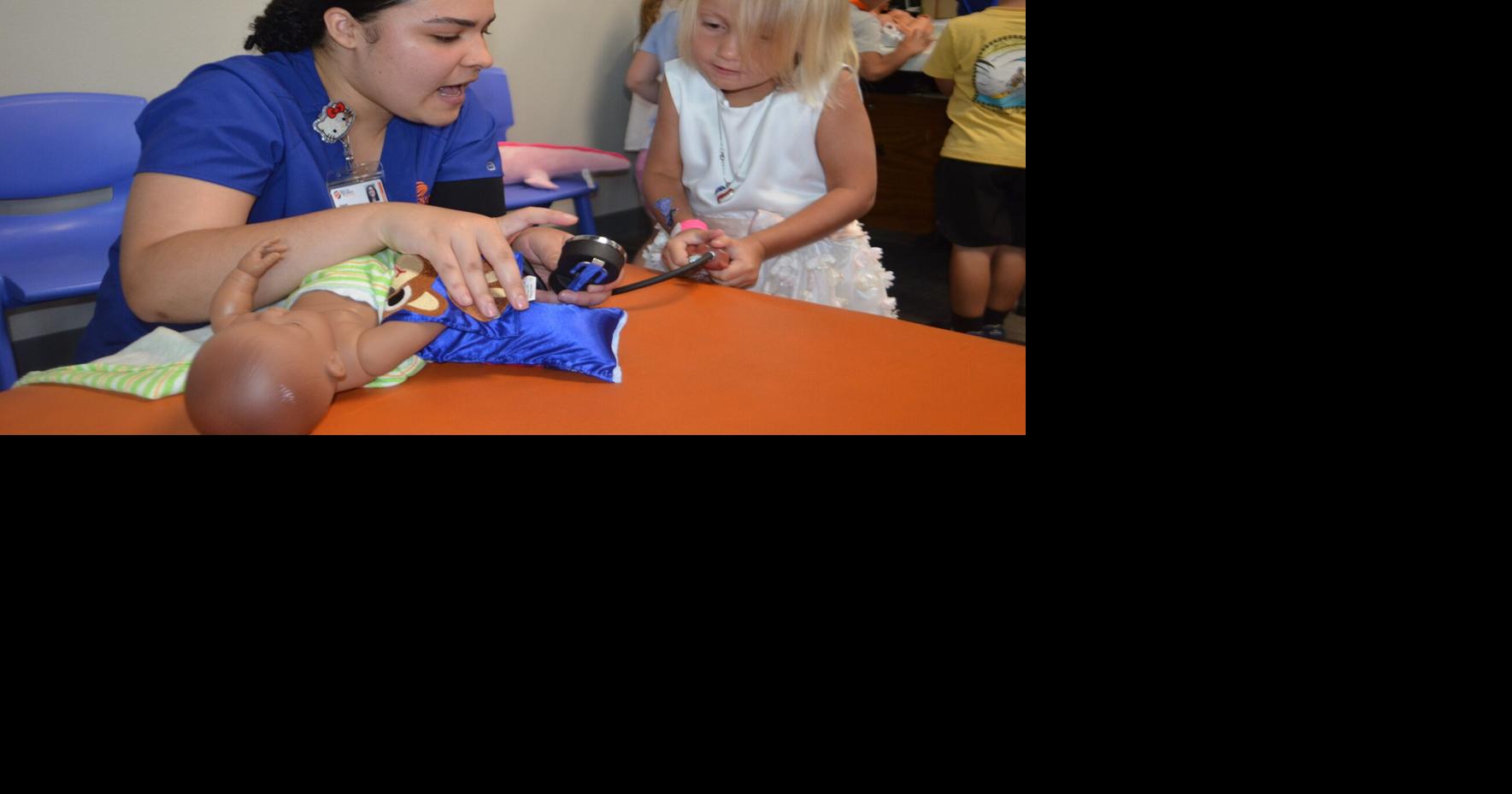 Nurses interact with children at Boo Boo Clinic | Highlands News-Sun ...