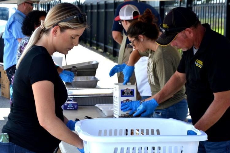 Rotarians host BBQ for responders | | midfloridanewspapers.com