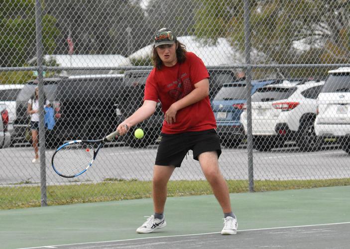 Green Dragons swing past Red Devils | Local | midfloridanewspapers.com