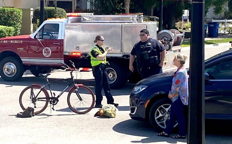 Bike, car collide downtown; possible serious injuries | Highlands News ...