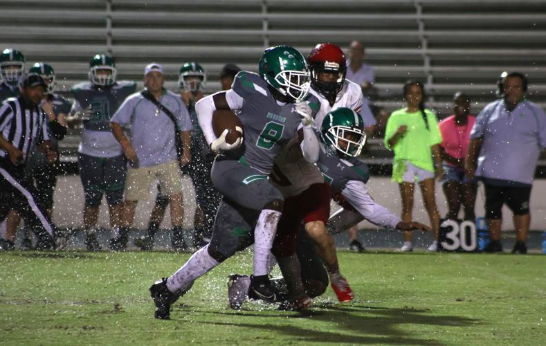 Green Dragons down Red Devils in mud bowl | Local ...