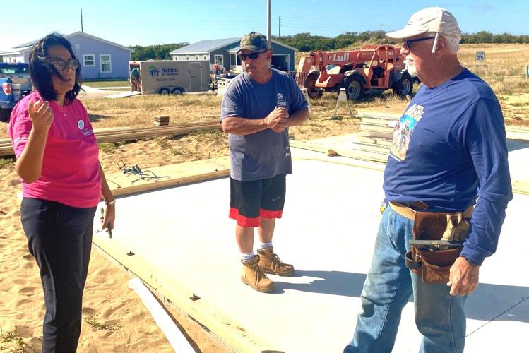 Snow days off: Michigan visitors help with Habitat homes | Highlands ...