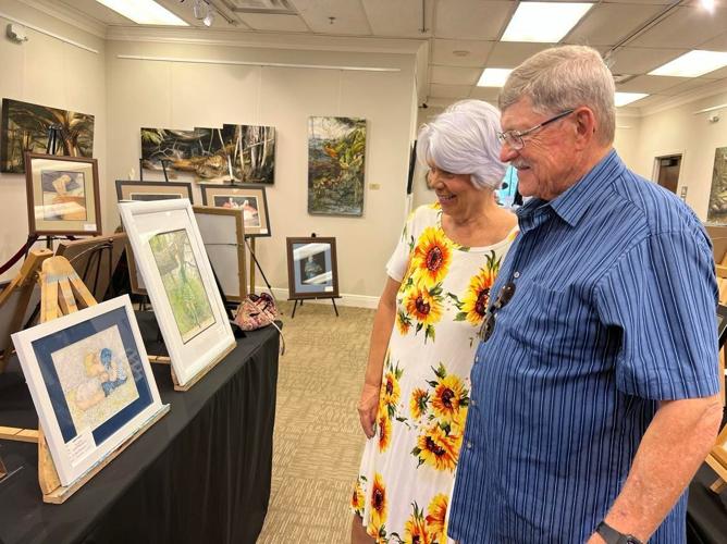 Gary Wyatt artist reception draws admirers | | midfloridanewspapers.com
