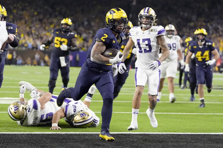 Michigan overpowers Washington 34-13 | National | midfloridanewspapers.com