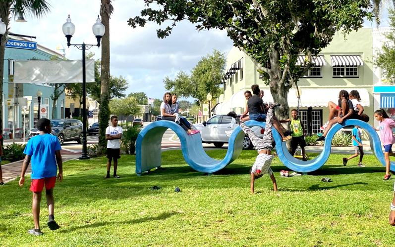 Kids enjoy climbing, tumbling by "The Wave" | Highlands News-Sun ...