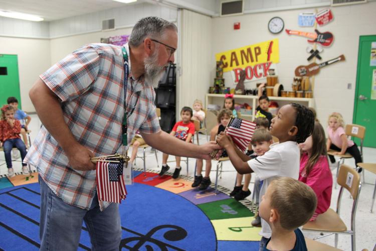 Hayes shares his passion for music with his students | News ...
