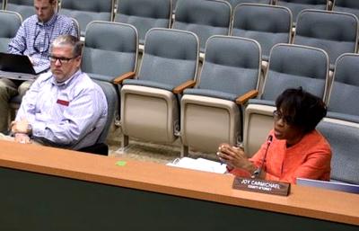 County Attorney Carmichael placed under County Administrator Vosburg ...