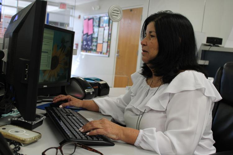 Mercedes Abascal pitches in to help at Fred Wild ...