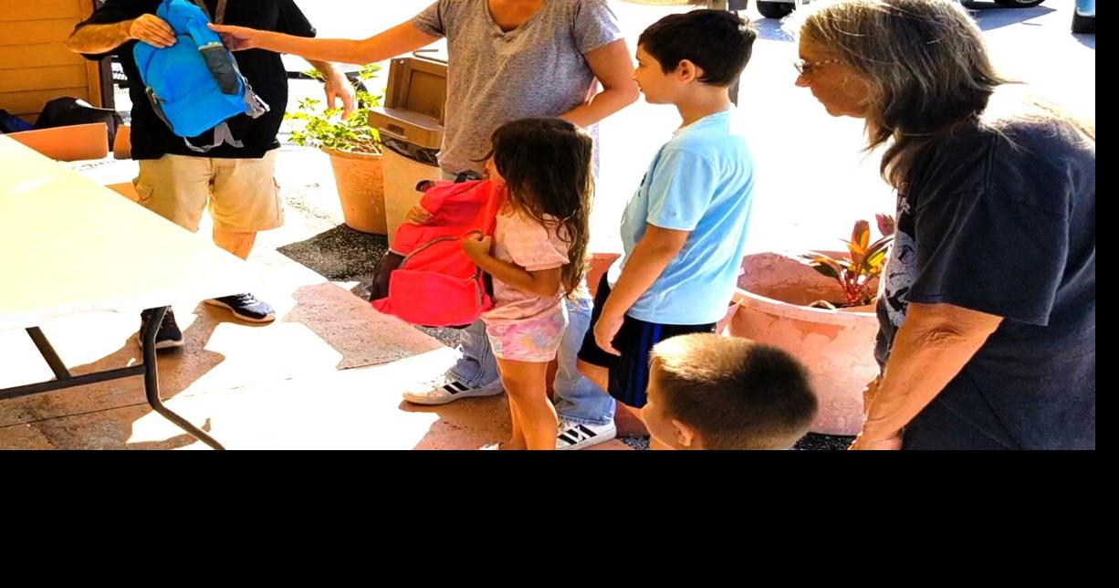 H.E.L.P. Organization gives kids 200 backpacks | News | midfloridanewspapers.com