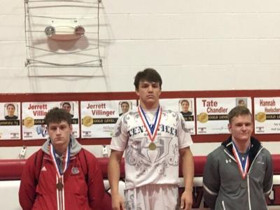 Hawks’ big day leads Holt to GAC wrestling championship | Sports ...