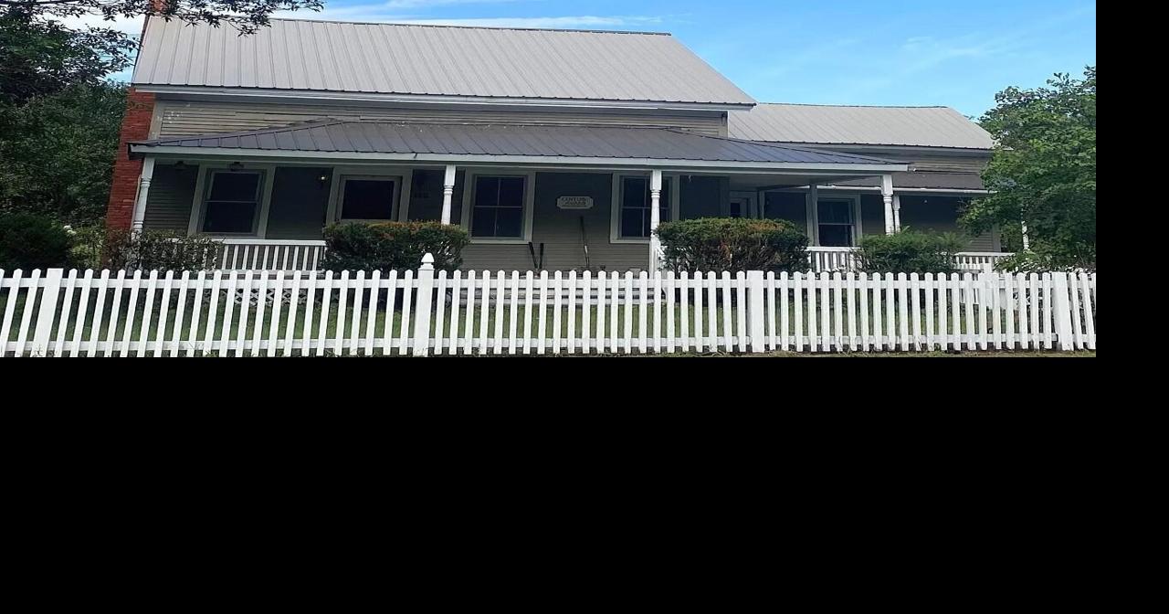 This $269,900 home in Milton has vaulted ceilings and a white picket ...