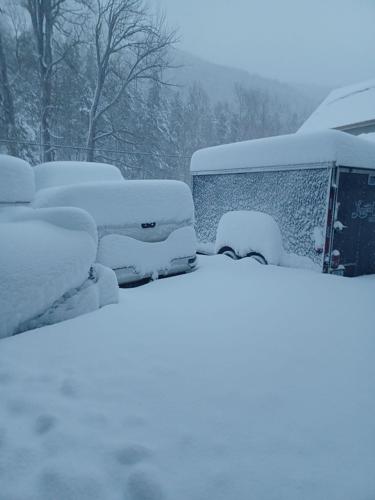 Snowy conditions impacting driving, causing power outages in Cascade ...