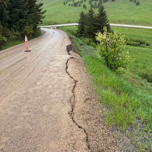 Evans Riceville Road near Belt down to one lane after slide | Great ...