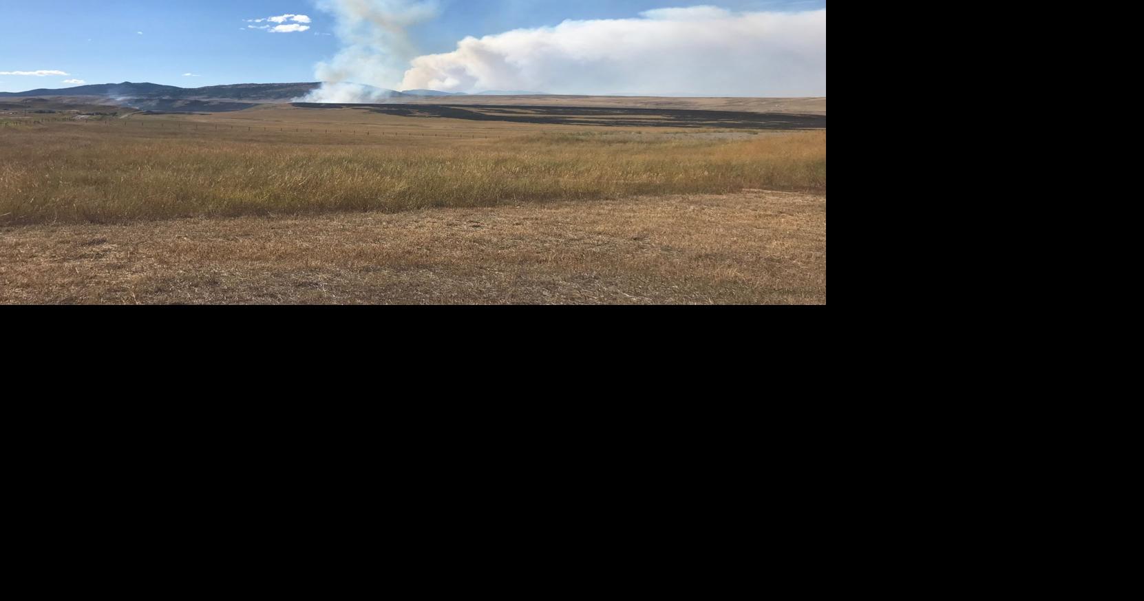 Agencies responding as vehicle fire sparks 200-acre wildfire near ...