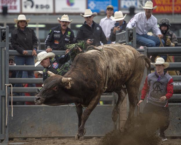 PHOTOS: A sold-out crowd watches the 2018 Professional Bull Riding at ...