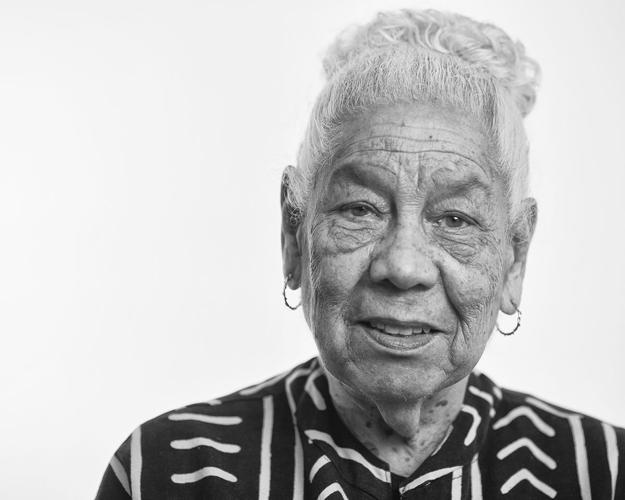 Community members look directly at the camera - and the viewer. | 0105 ...