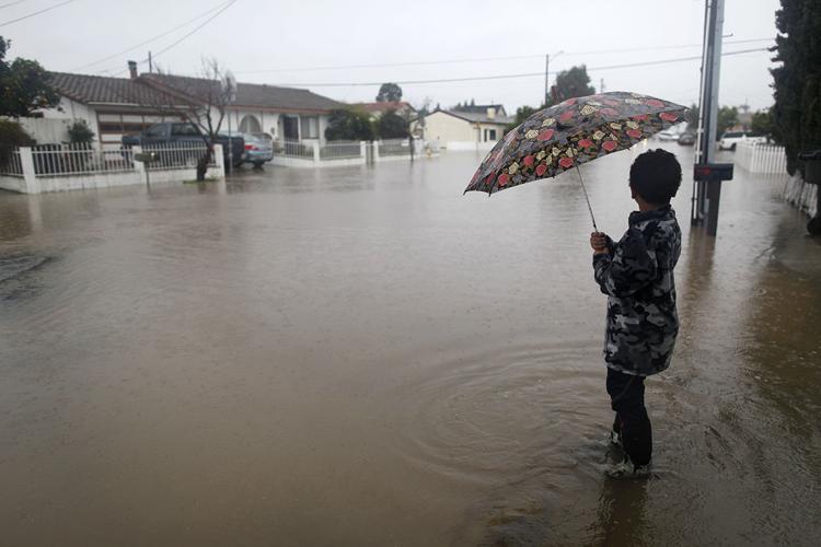 PHOTOS: Heavy storms lead to flooding, power outages and evacuations in ...