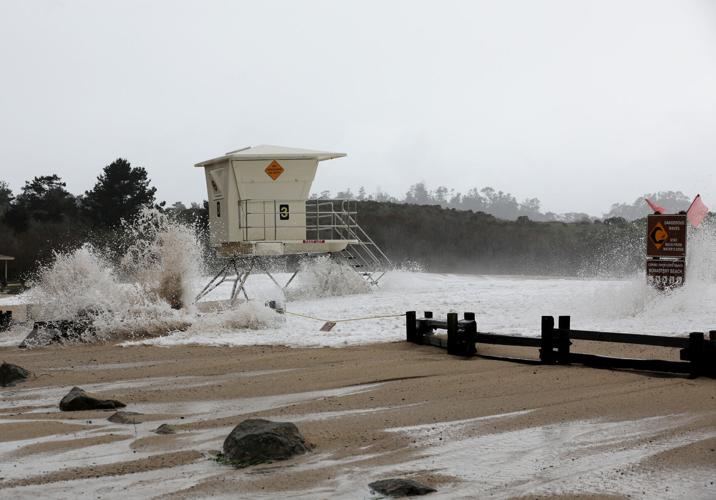 PHOTOS: A winter storm brings wind, rain and big waves to Monterey ...