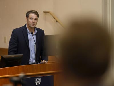 Chris Cook, Cal Am's local director of operations, tenders his ...