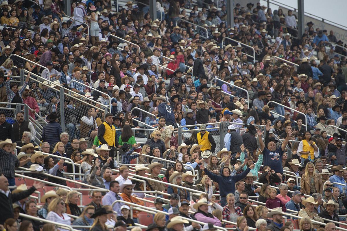 PHOTOS: A sold-out crowd watches the 2018 Professional Bull Riding at ...