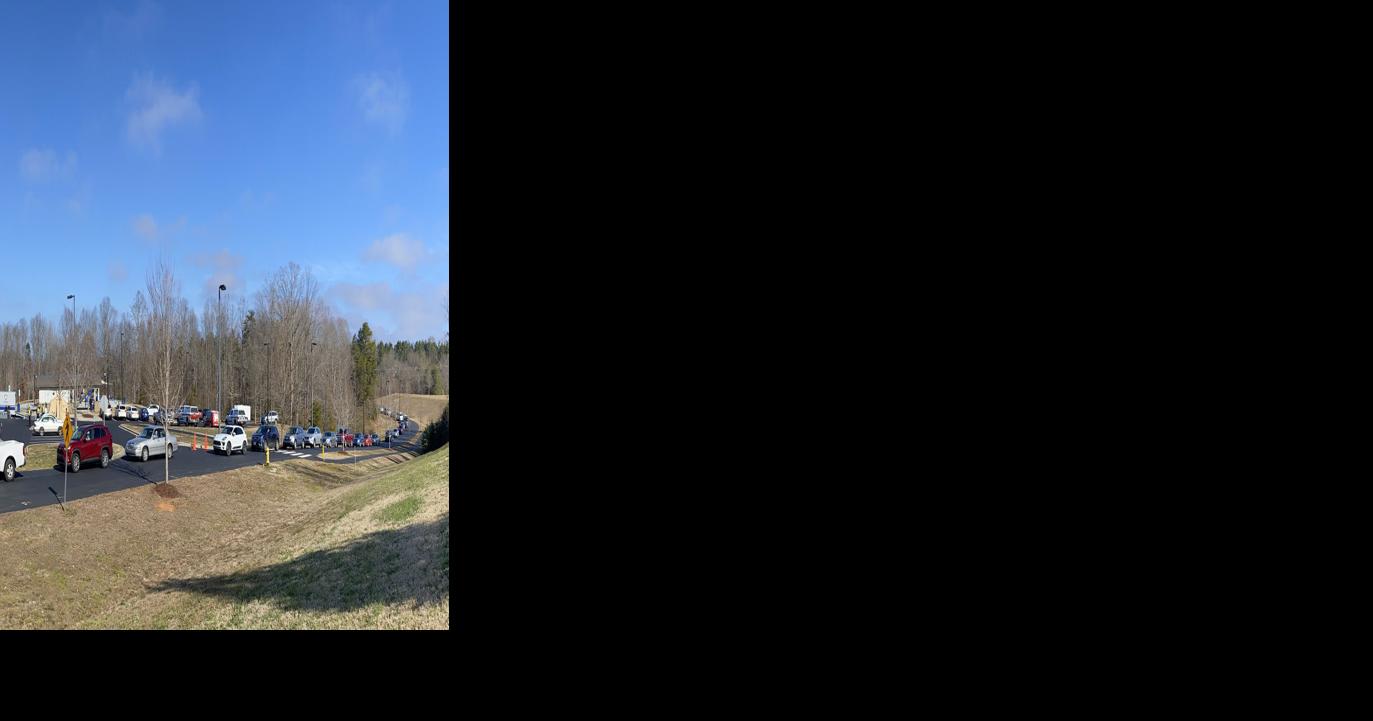 Drive-thru COVID-19 vaccinations goes 'much better' at Mazeppa Park