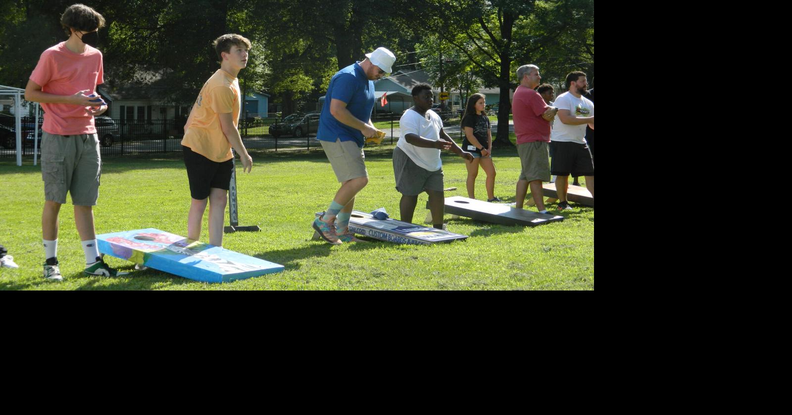Teams compete in cornhole tournament