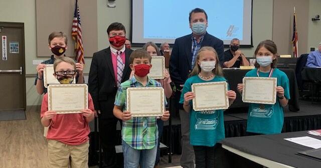 Students honored for winning entries into math expo