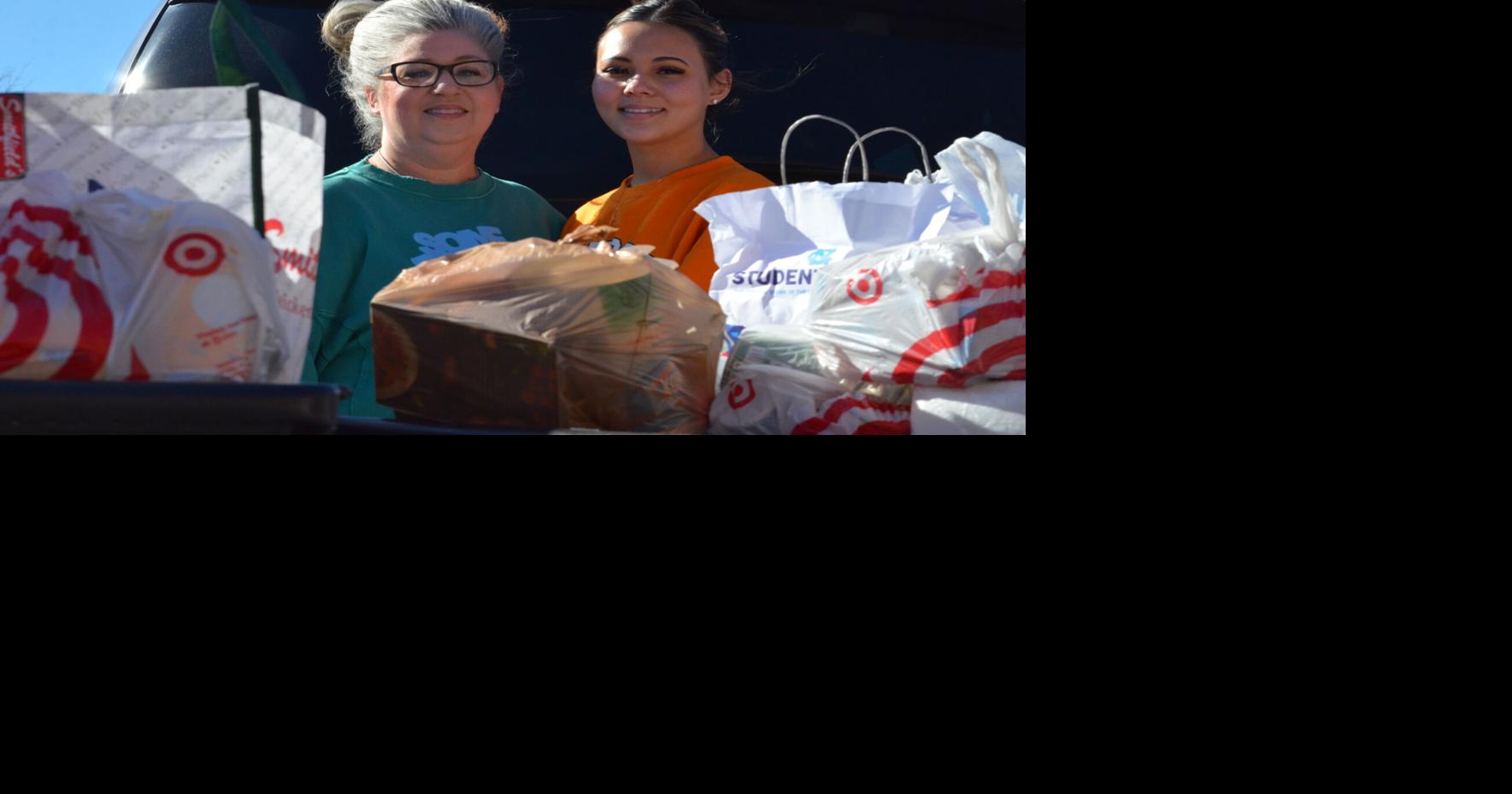 Nancy Jung and Mina Jung bring food collected by Se'Ri Jung and the UNC ...