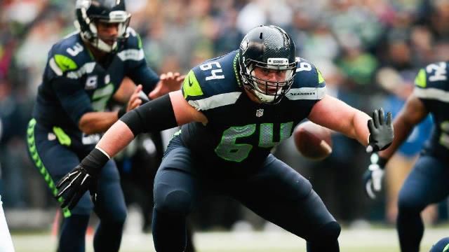 Completing circle, Sweezy returns to Seattle’s huddle