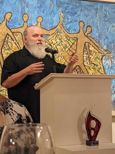 Ty Manning accepts award during STMA Founders Day | News ...