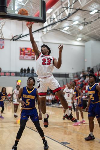 MCHS boys varsity upsets ARC in first region match of basketball season ...