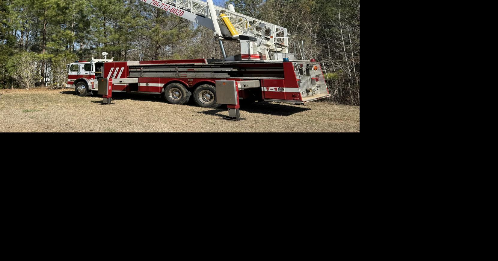 Cat saved from treetop in ladder truck rescue | News ...