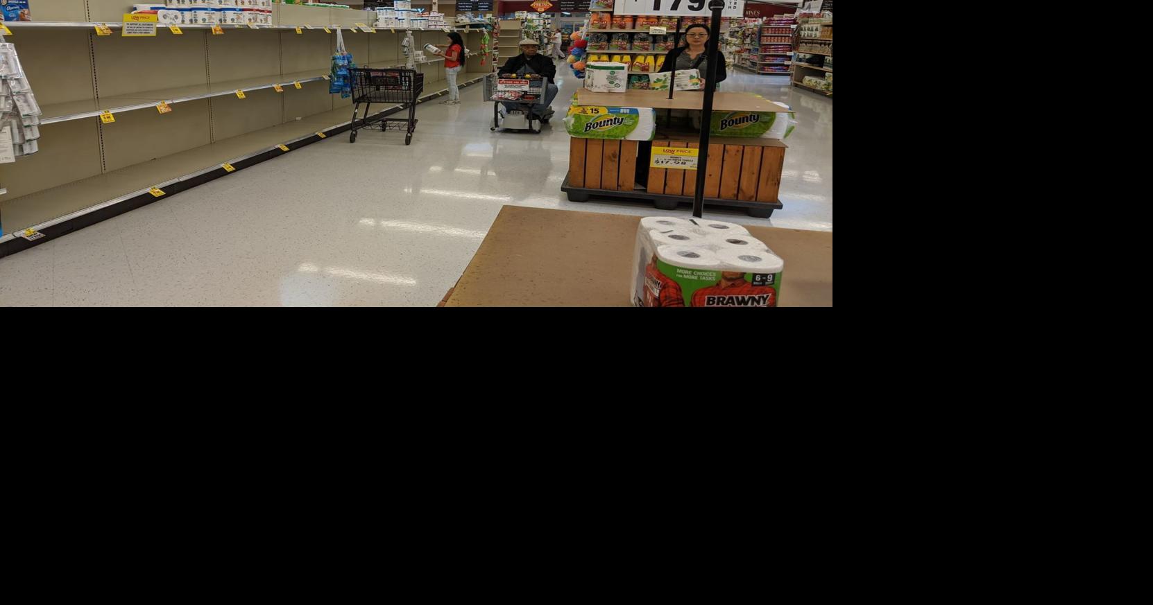 Pandemic leads customers to stock up on supplies, leaves store shelves bare