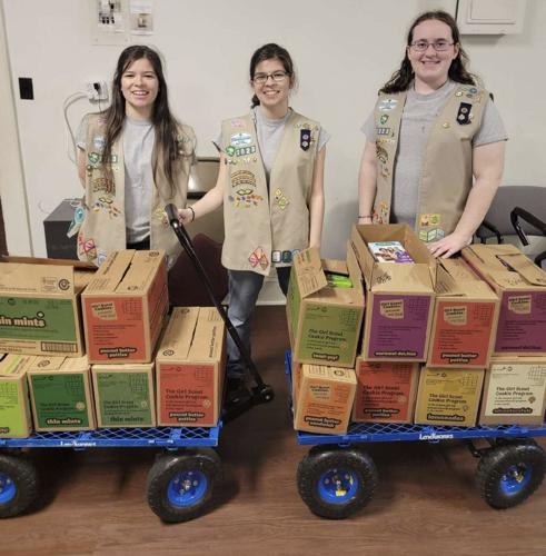 Girl Scout troop donates cookies to food pantry